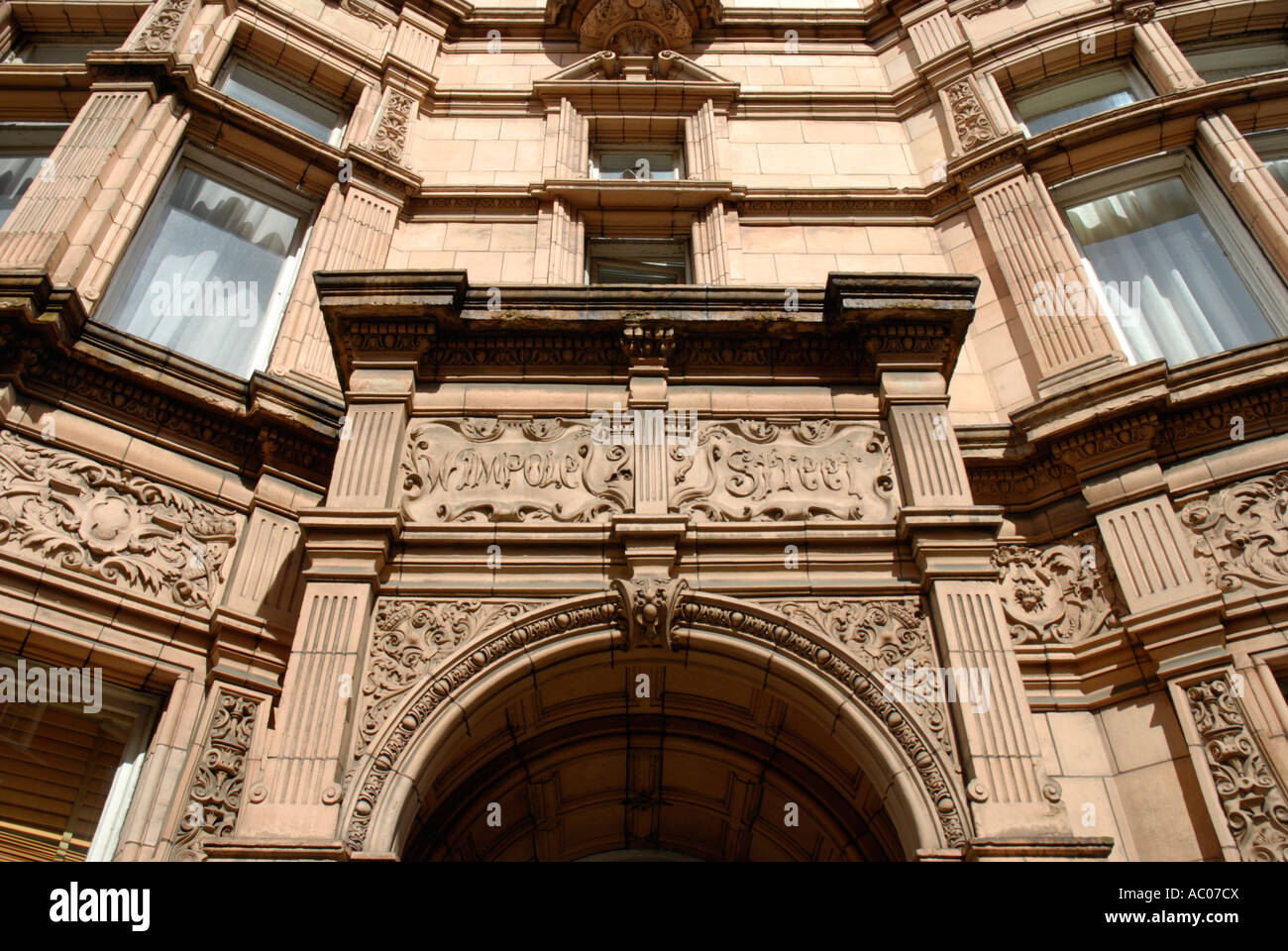 Exterior of Wimpole House ornate terracotta stone building in Wimpole ...