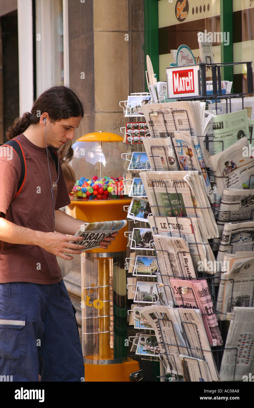 Newspaper stand with international papers Stock Photo - Alamy