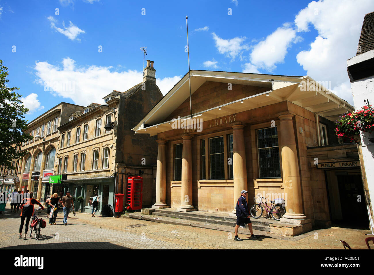 The ancient stone library building in the centre of old market town ...