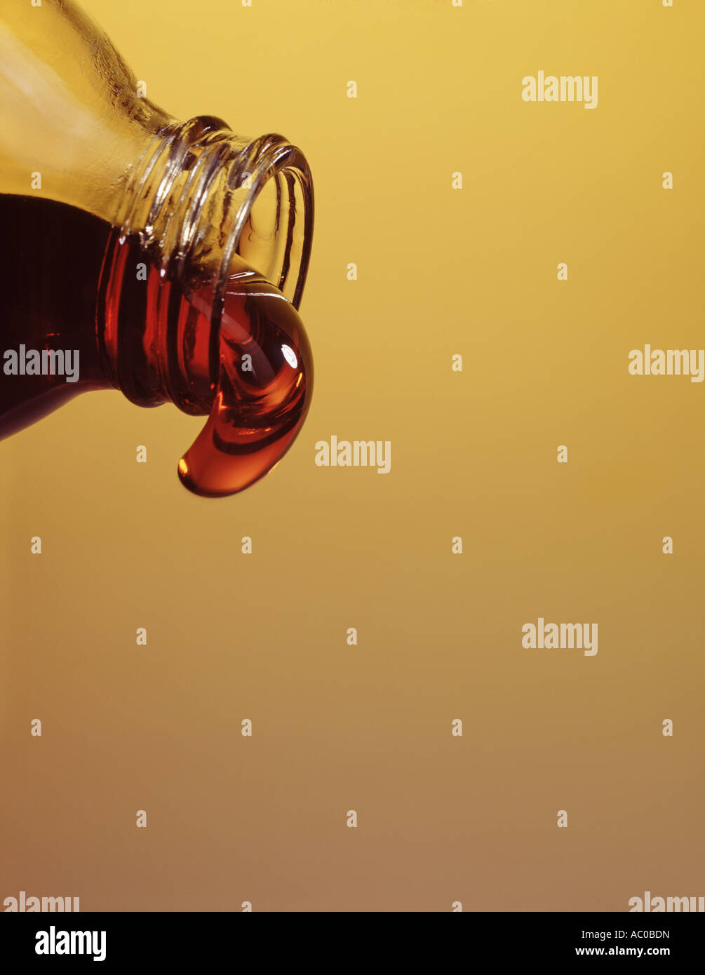 pour pouring syrup bottle close up copy space Stock Photo - Alamy