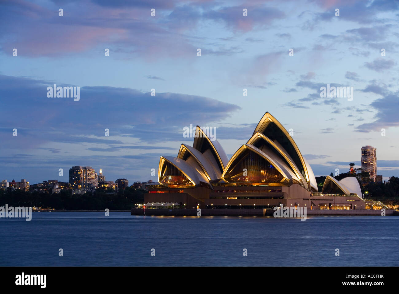 The Sydney Opera House illumated at Bennelong Point Stock Photo - Alamy