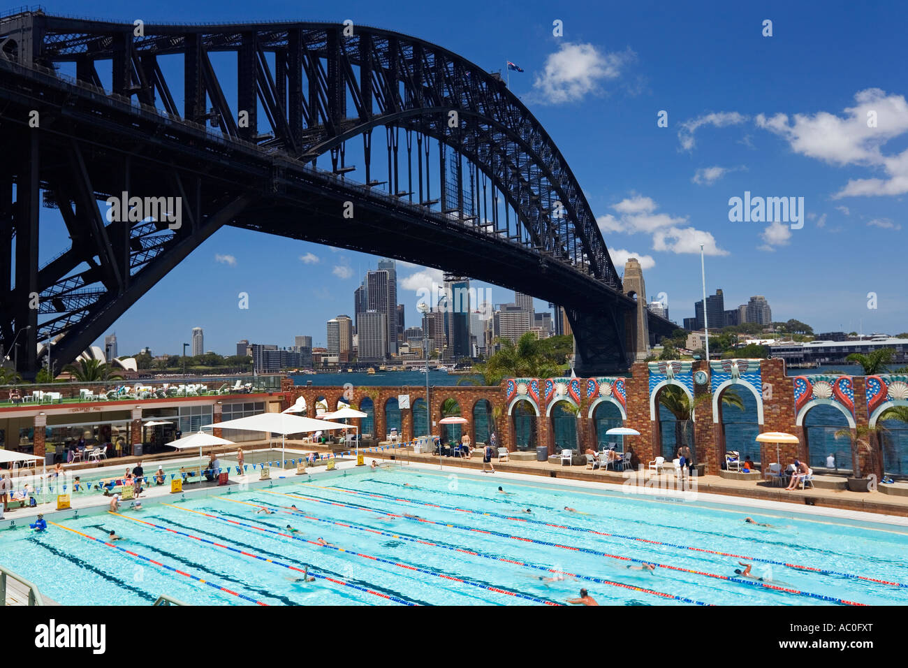 Swimmers do laps at the scenic North Sydney pool at Milsons Point at ...