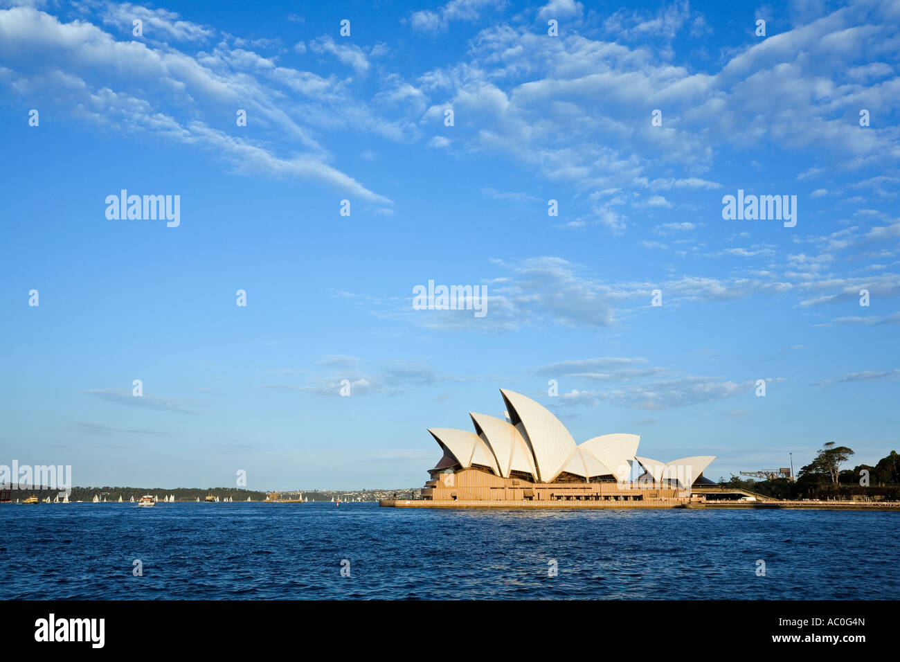The iconic Opera House at Bennelong Point on Sydney harbour Stock Photo ...