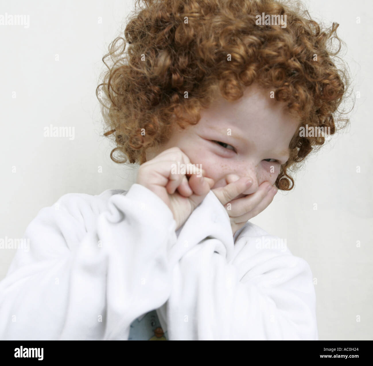 Little boy making faces Stock Photo - Alamy