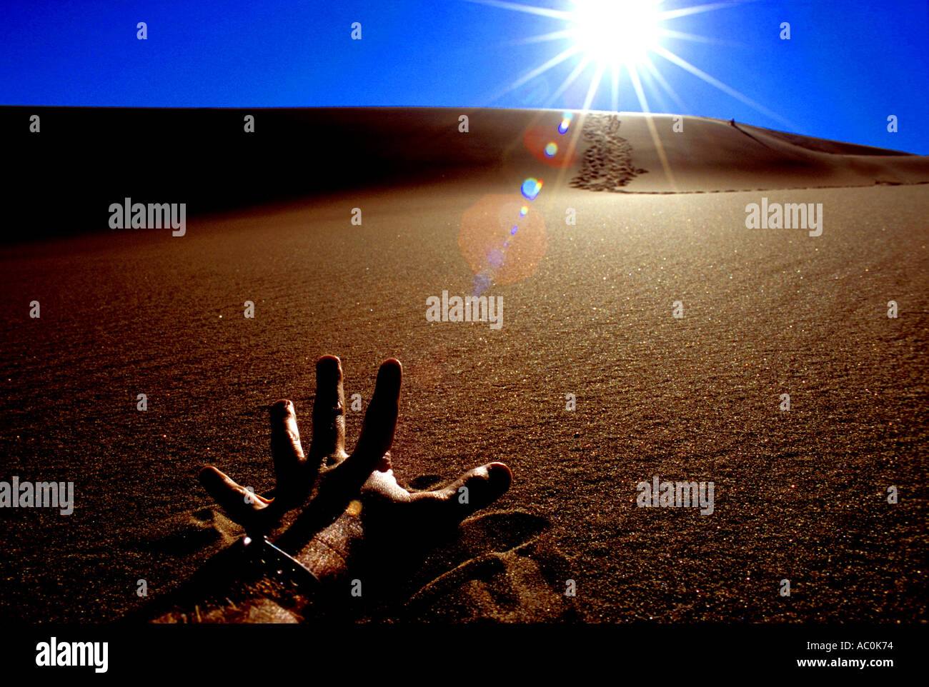 Person under sand in desert hi-res stock photography and images - Alamy