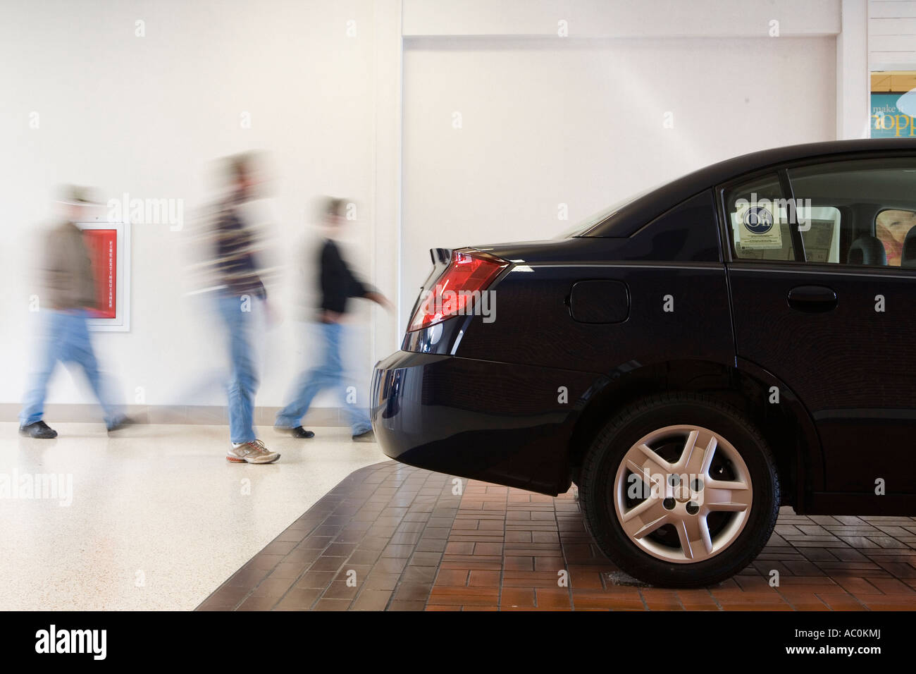 A car for sale on display inside of a mall Stock Photo - Alamy