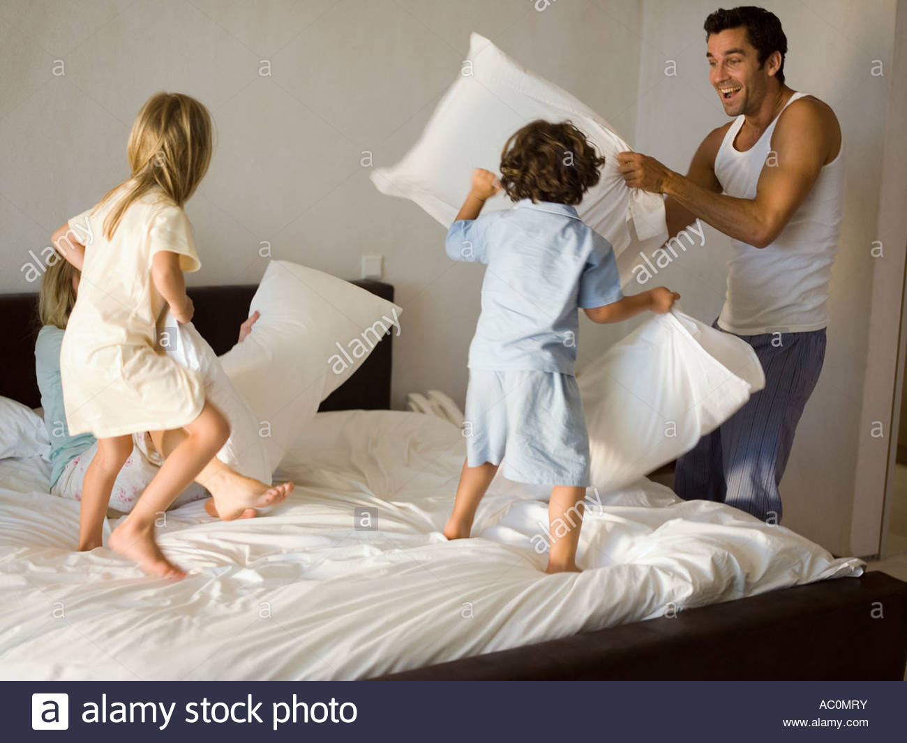 Mum And Kids Playing Inside High Resolution Stock Photography and ...