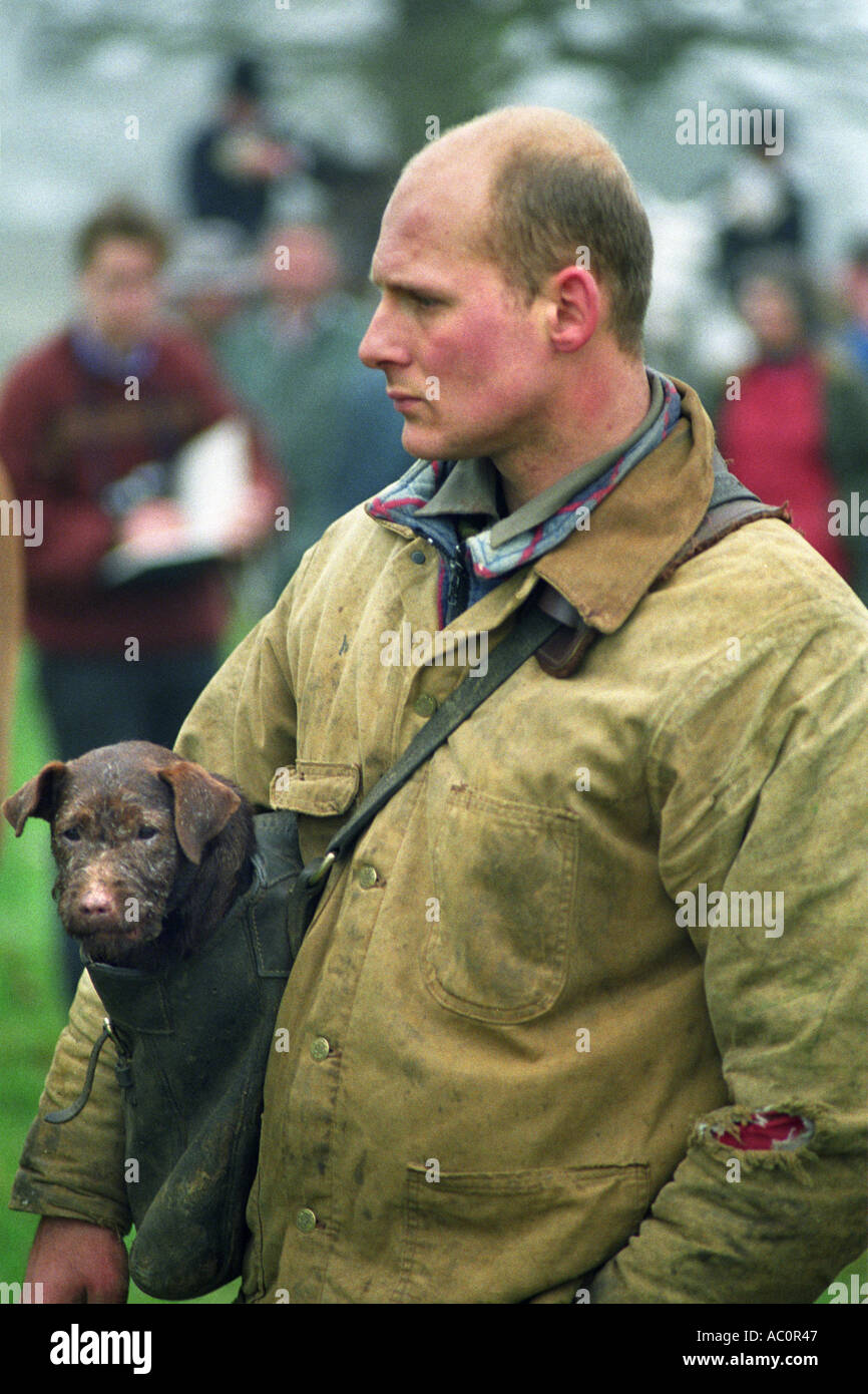 A TERRIERMAN WITH THE BEAUFORT HUNT IN SOUTH GLOUCESTERSHIRE UK WHO IS ...
