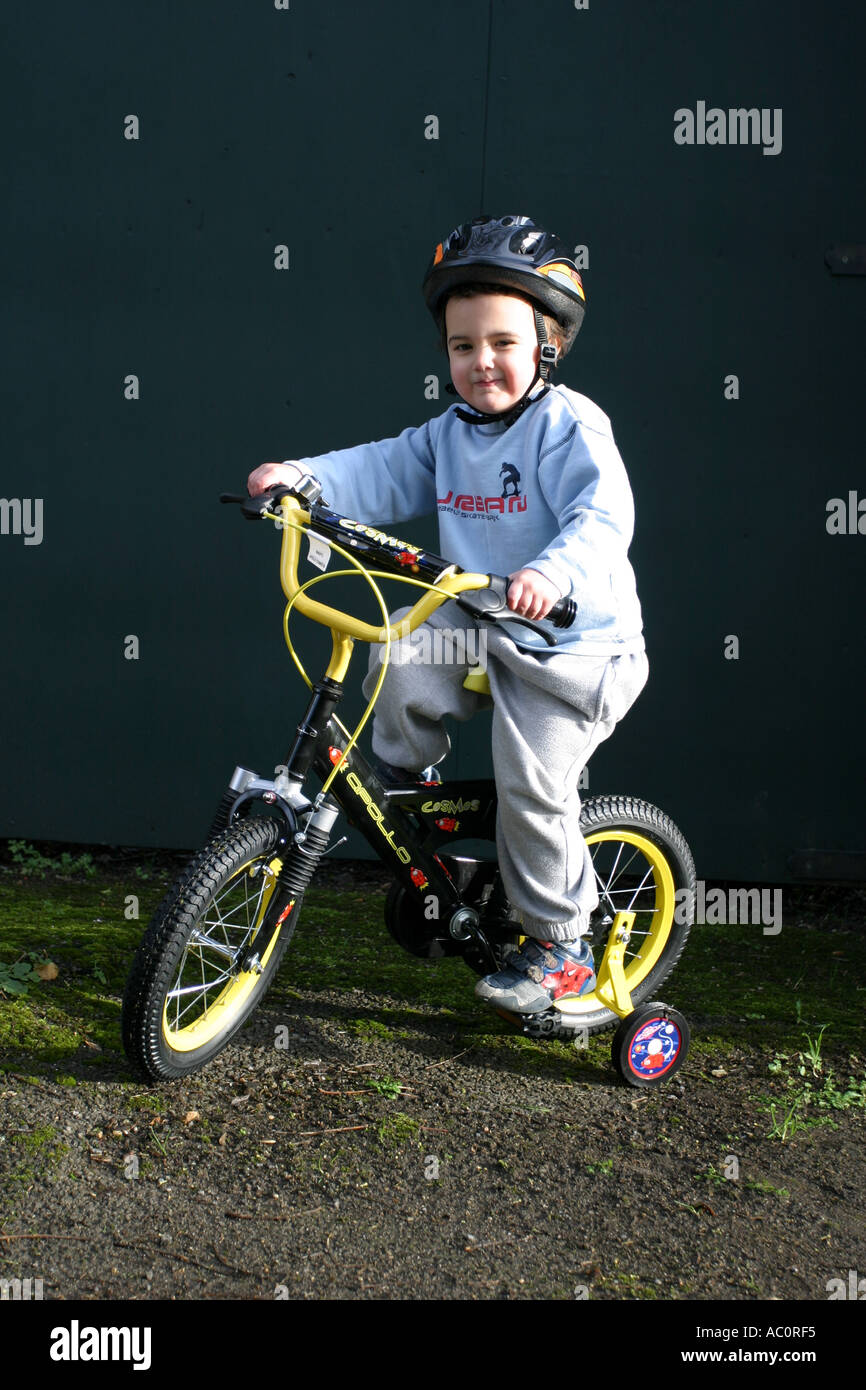 Small boy shows off his new bicycle on Christmas Day Stock Photo - Alamy