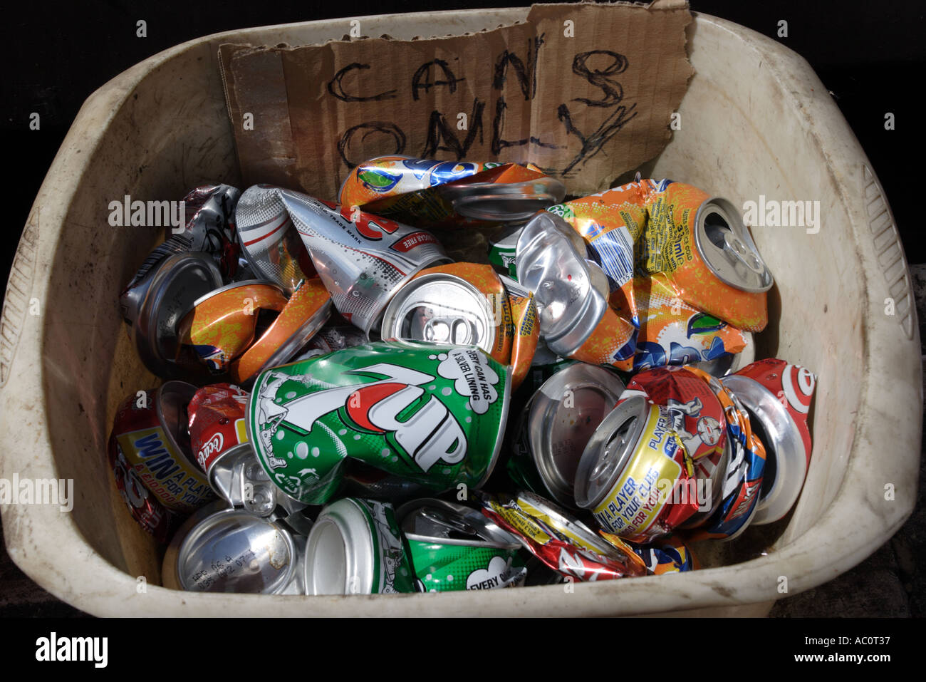 Tin cans and plastic bottles for recycling Stock Photo - Alamy