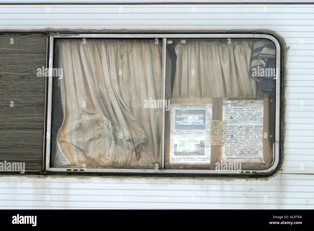 Ancient camper van with lots of interesting signs and objects in the ...