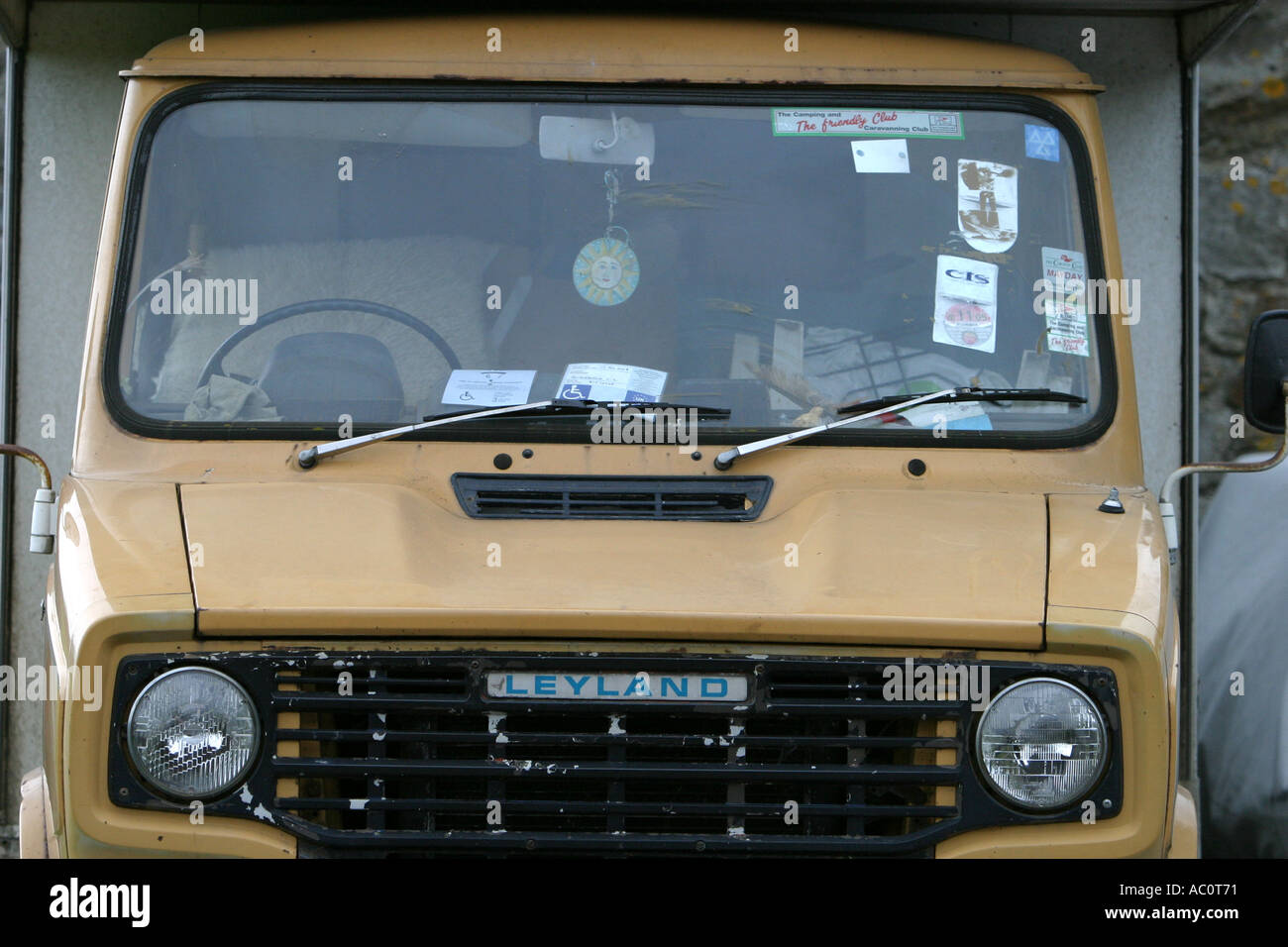 Ancient camper van with lots of interesting signs and objects in the ...