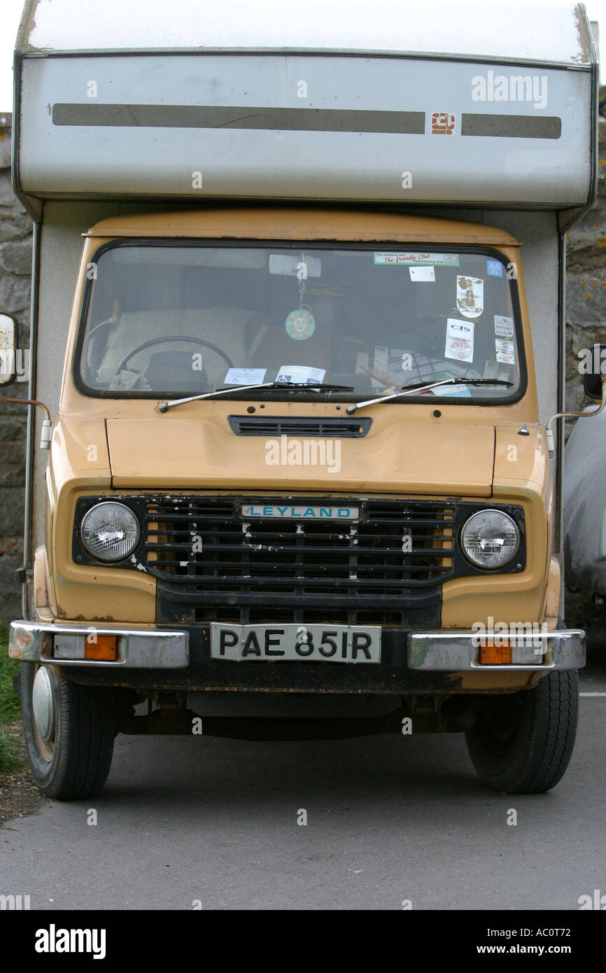 Ancient camper van with lots of interesting signs and objects in the ...