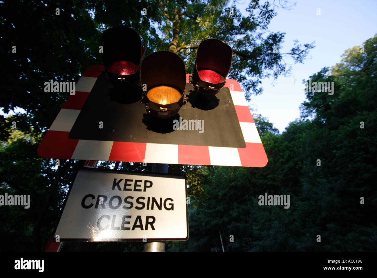 Signalling lights at a level crossing Stock Photo - Alamy
