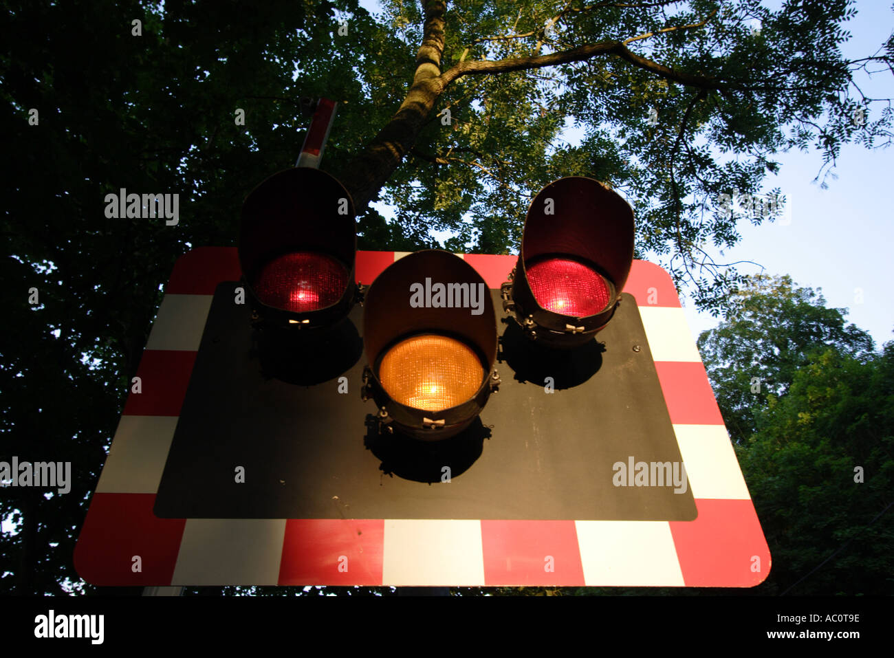 Signalling lights at a level crossing Stock Photo - Alamy
