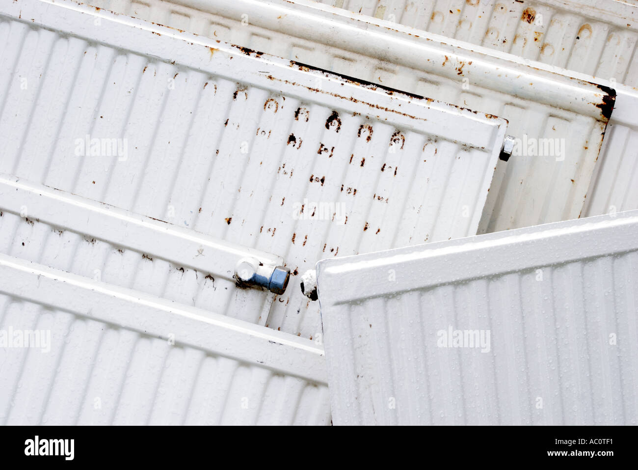 Old radiators removed from central heating system Stock Photo - Alamy