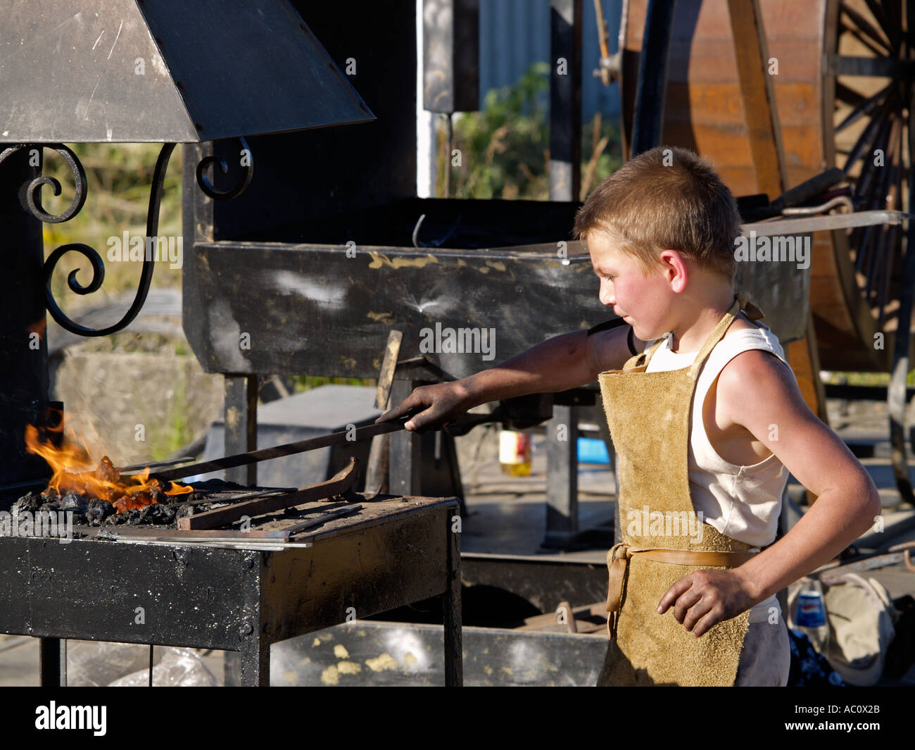 Blacksmith With Boy High Resolution Stock Photography and Images - Alamy