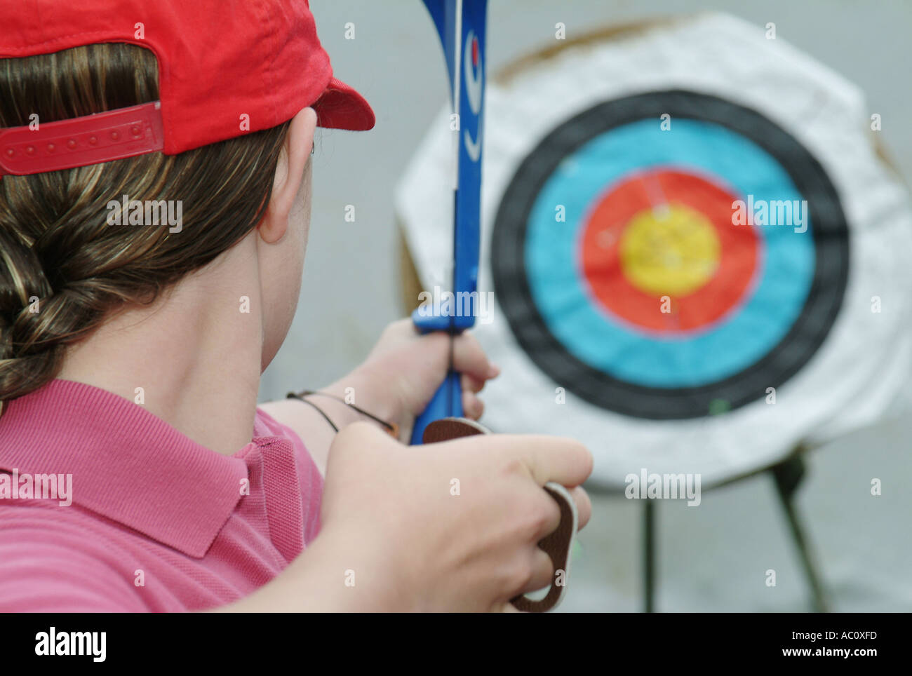 girl archer shooting at target Stock Photo - Alamy