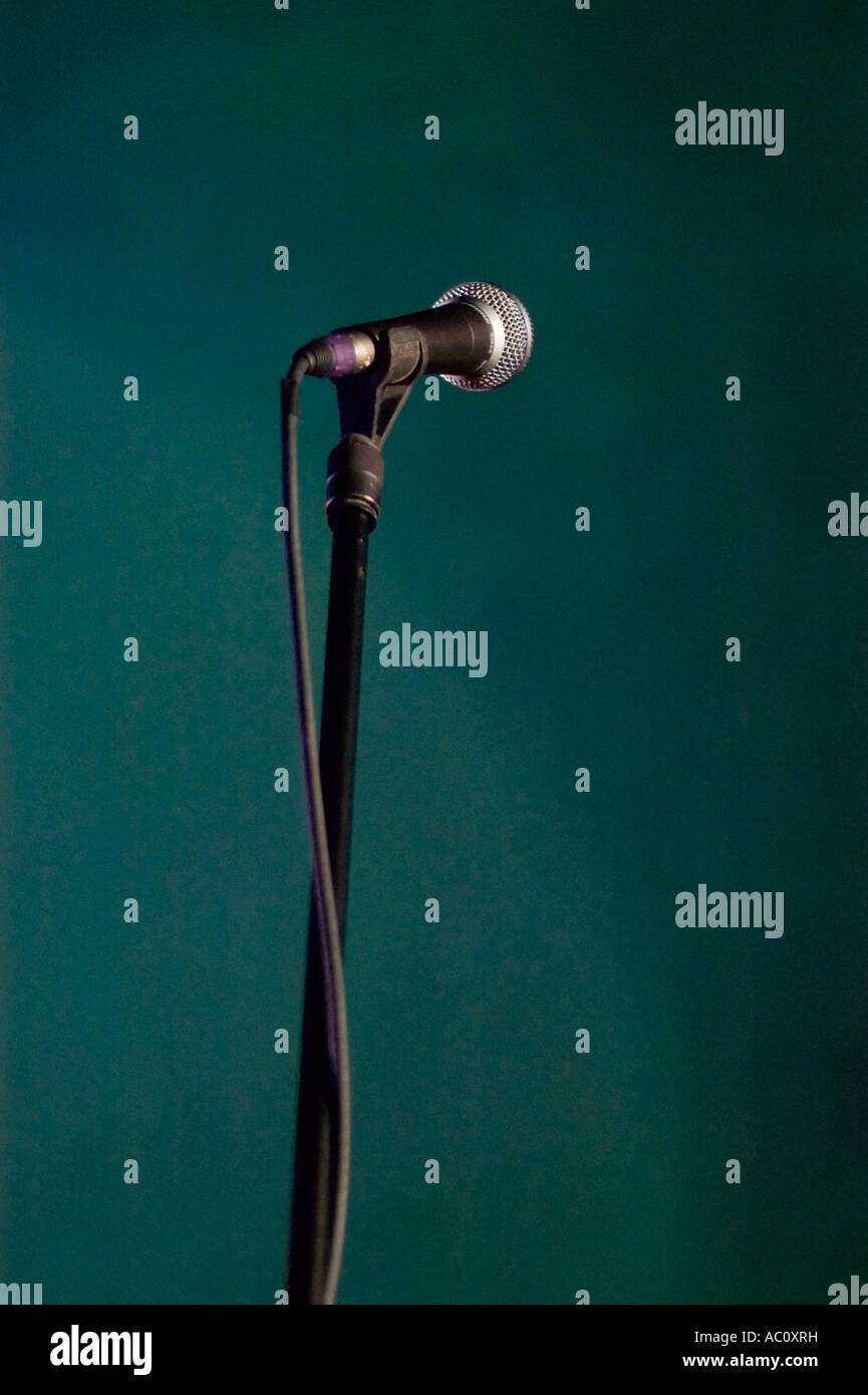 a microphone on stage Stock Photo - Alamy