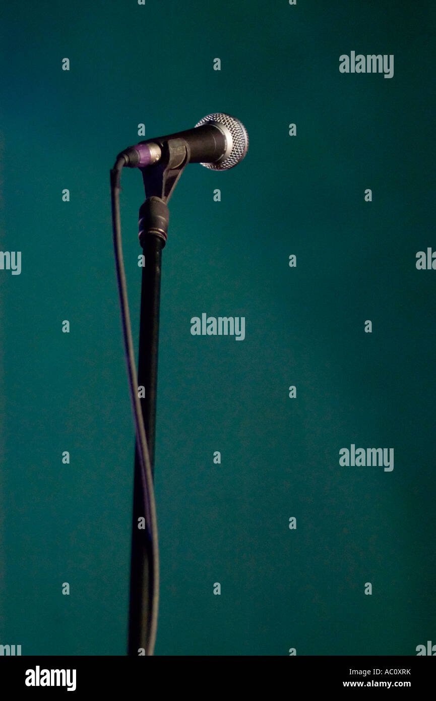 a microphone on stage Stock Photo - Alamy