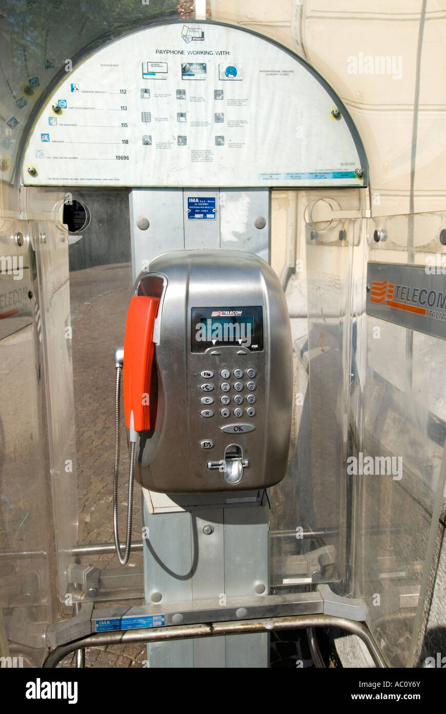 a payphone in north italy Stock Photo - Alamy