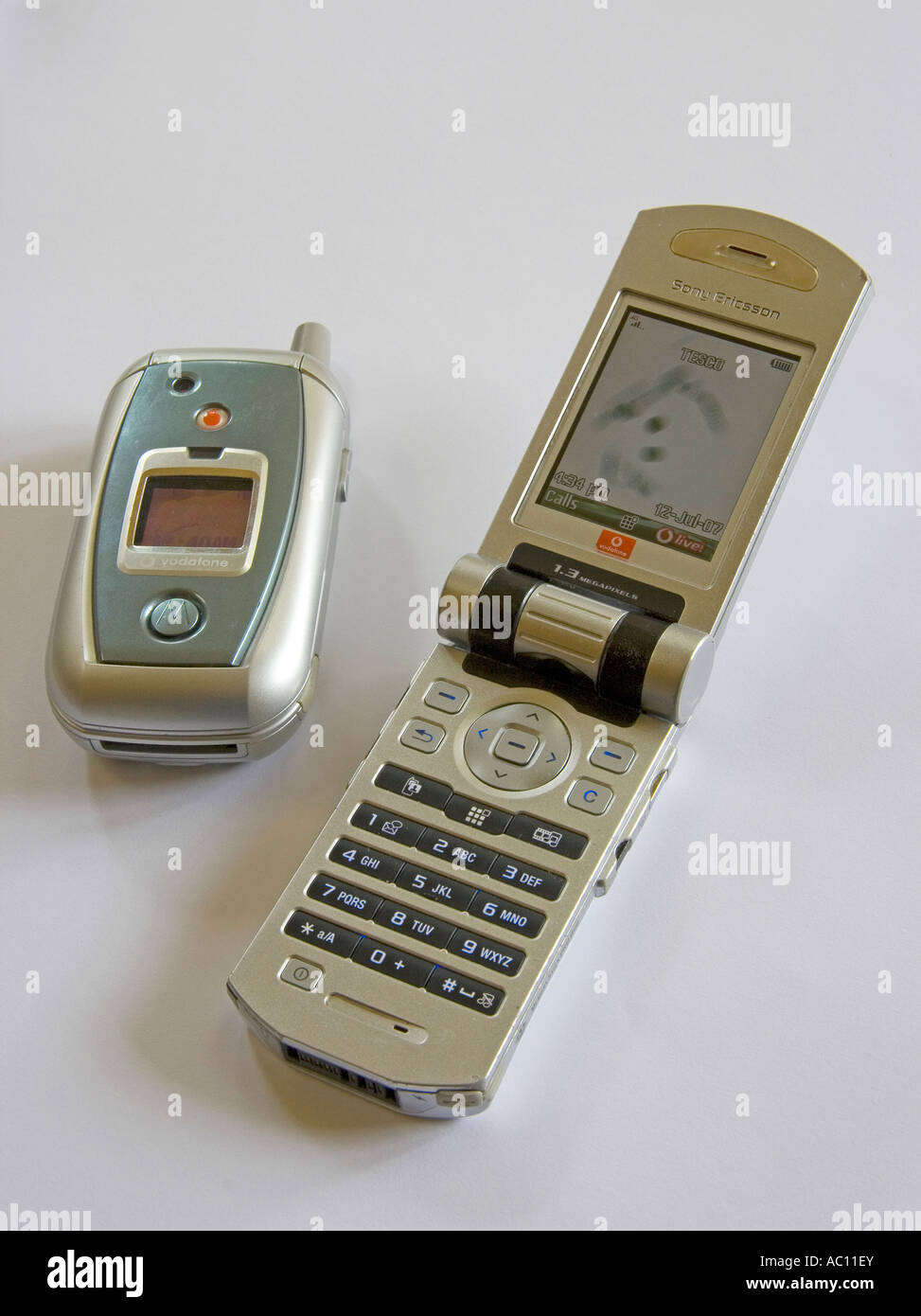 A close up of two cell phones Stock Photo - Alamy