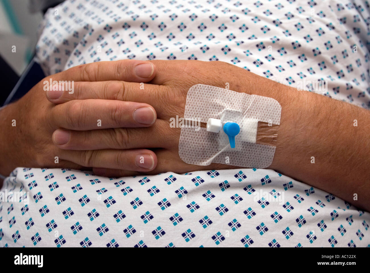 Post operative patient recovering from operation with Cannula fitted to ...