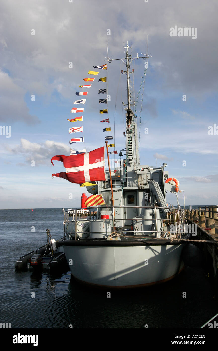 Marine vessel with danish flag and pennants Stock Photo - Alamy