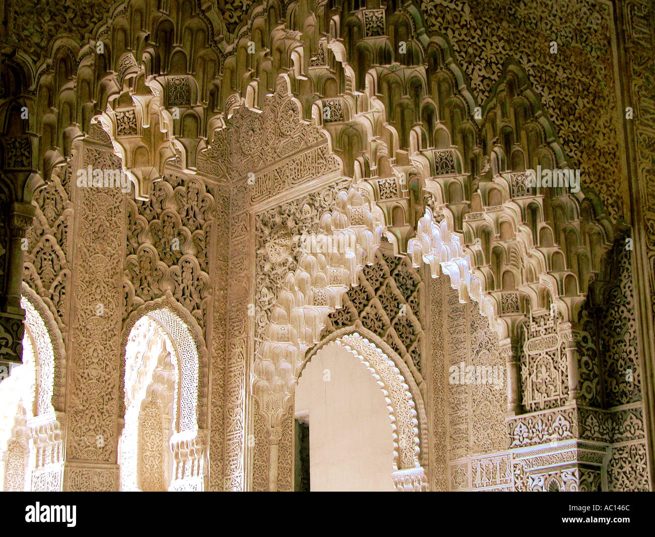 alhambra interior shwoing delicate moorish designs Stock Photo - Alamy