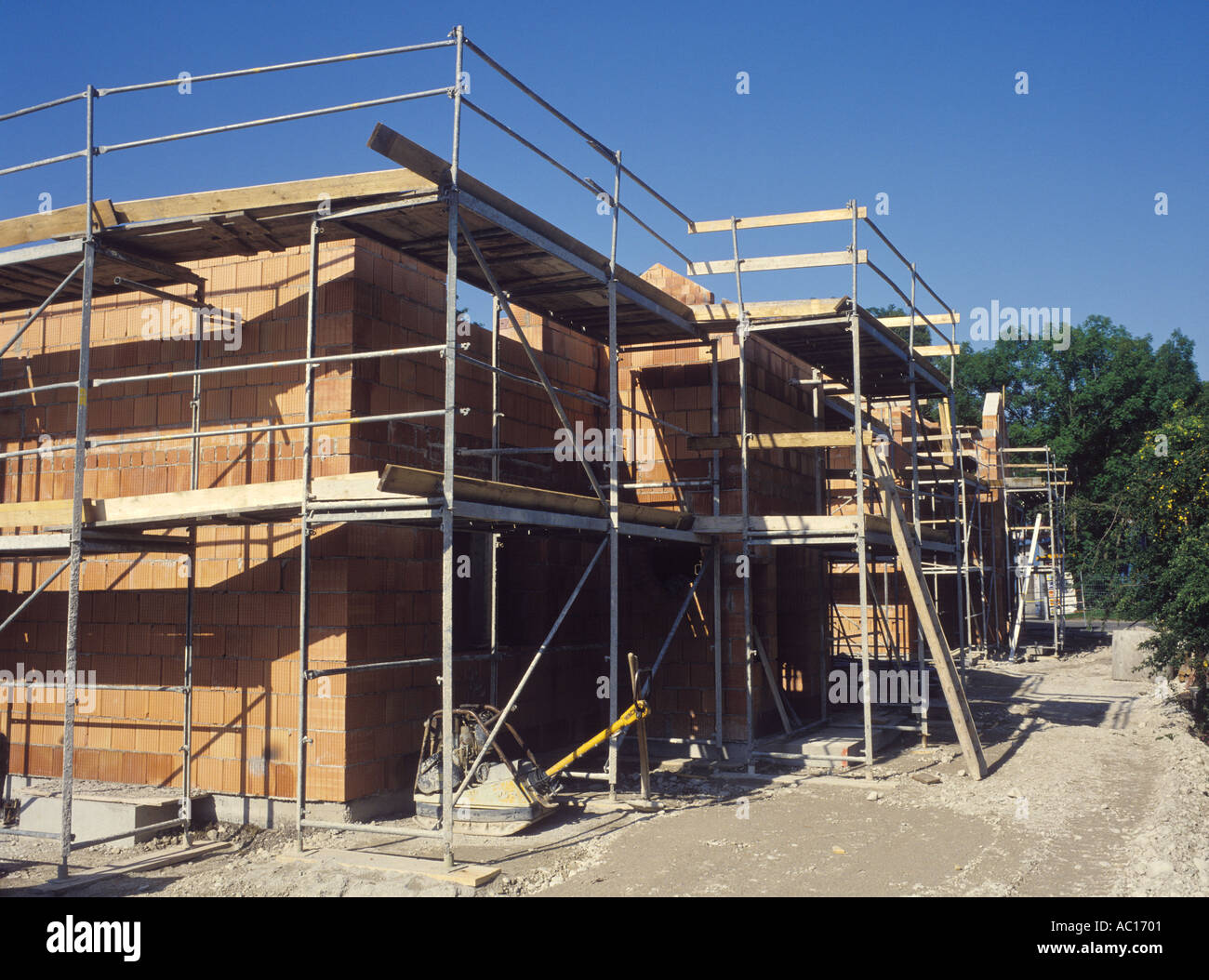 Structure of a houses with scaffold Stock Photo - Alamy