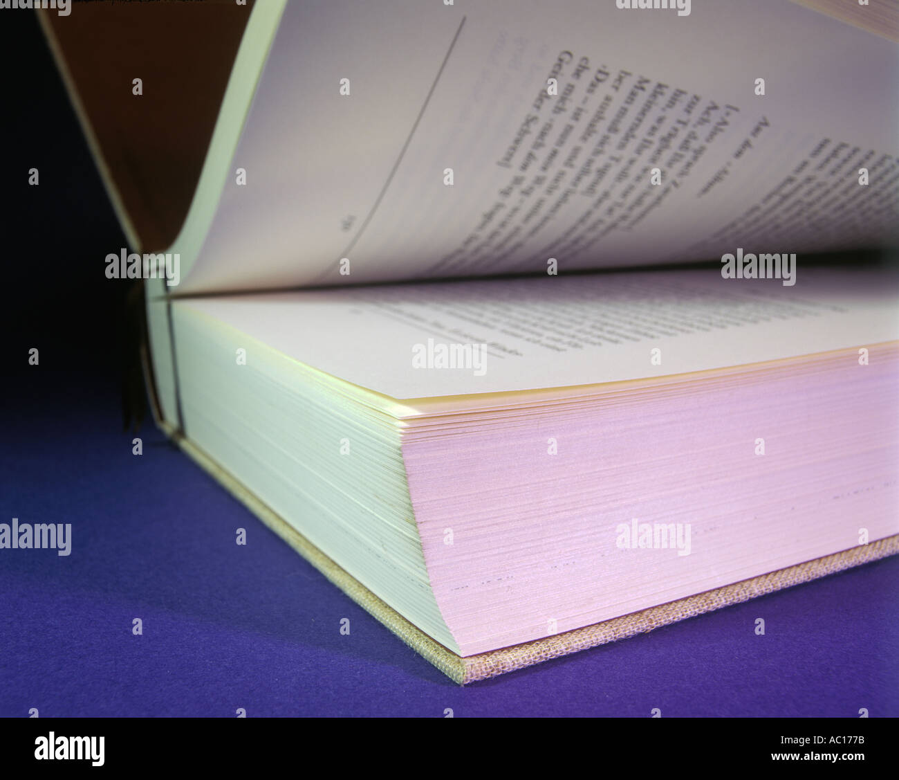 Thick open book Stock Photo - Alamy