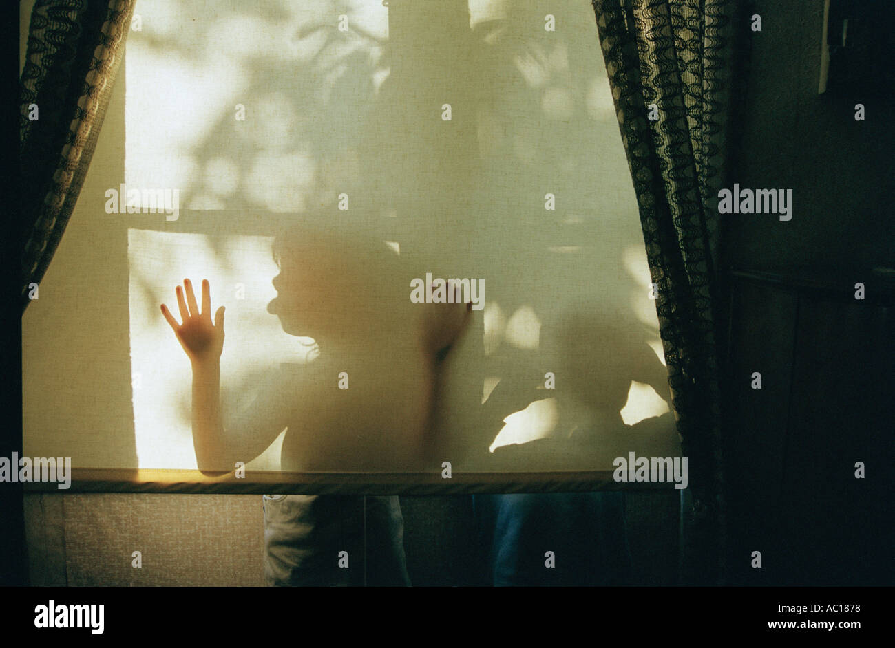 Shadows on a curtain Stock Photo - Alamy