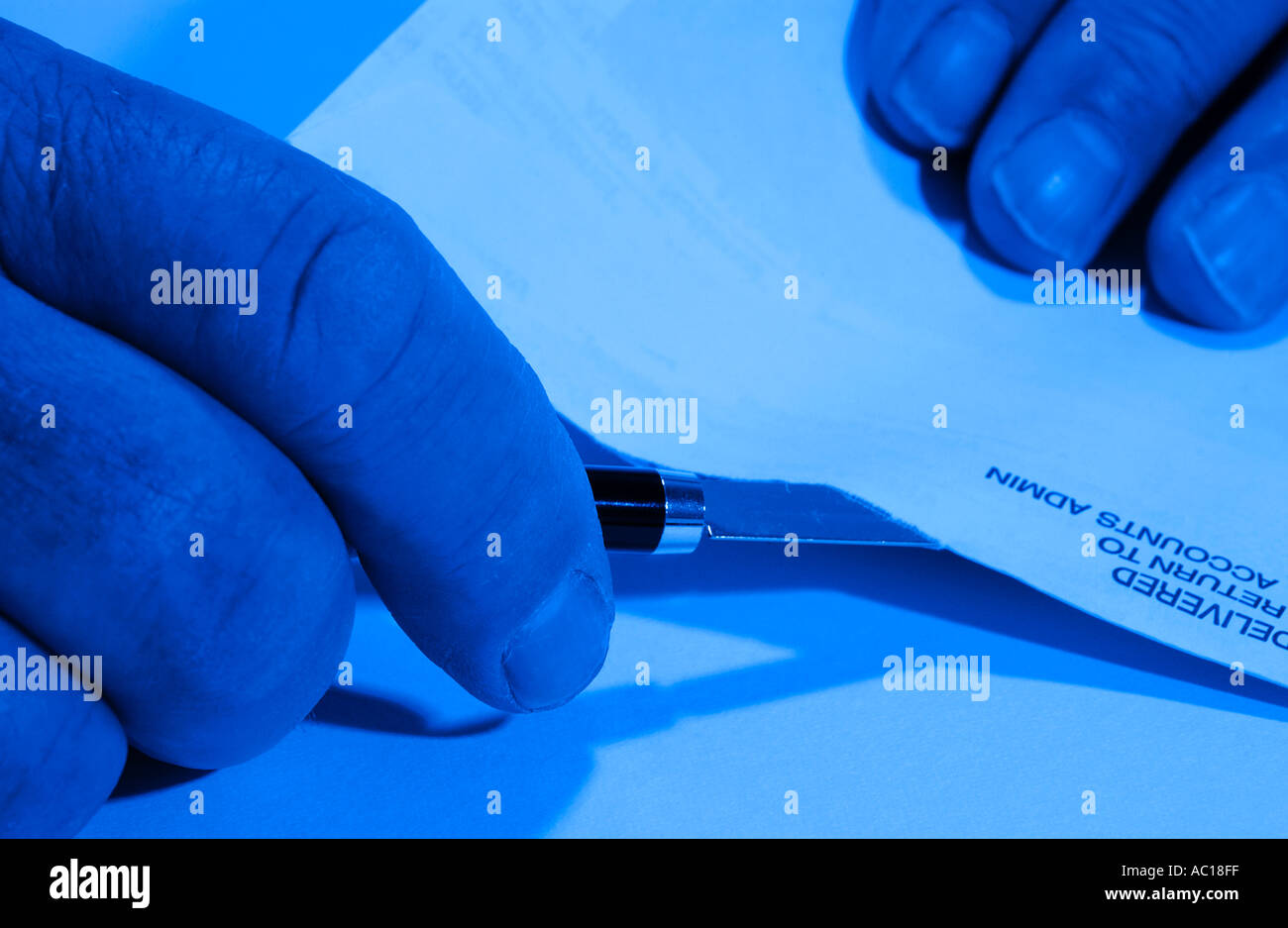 hands using paper knife Stock Photo - Alamy