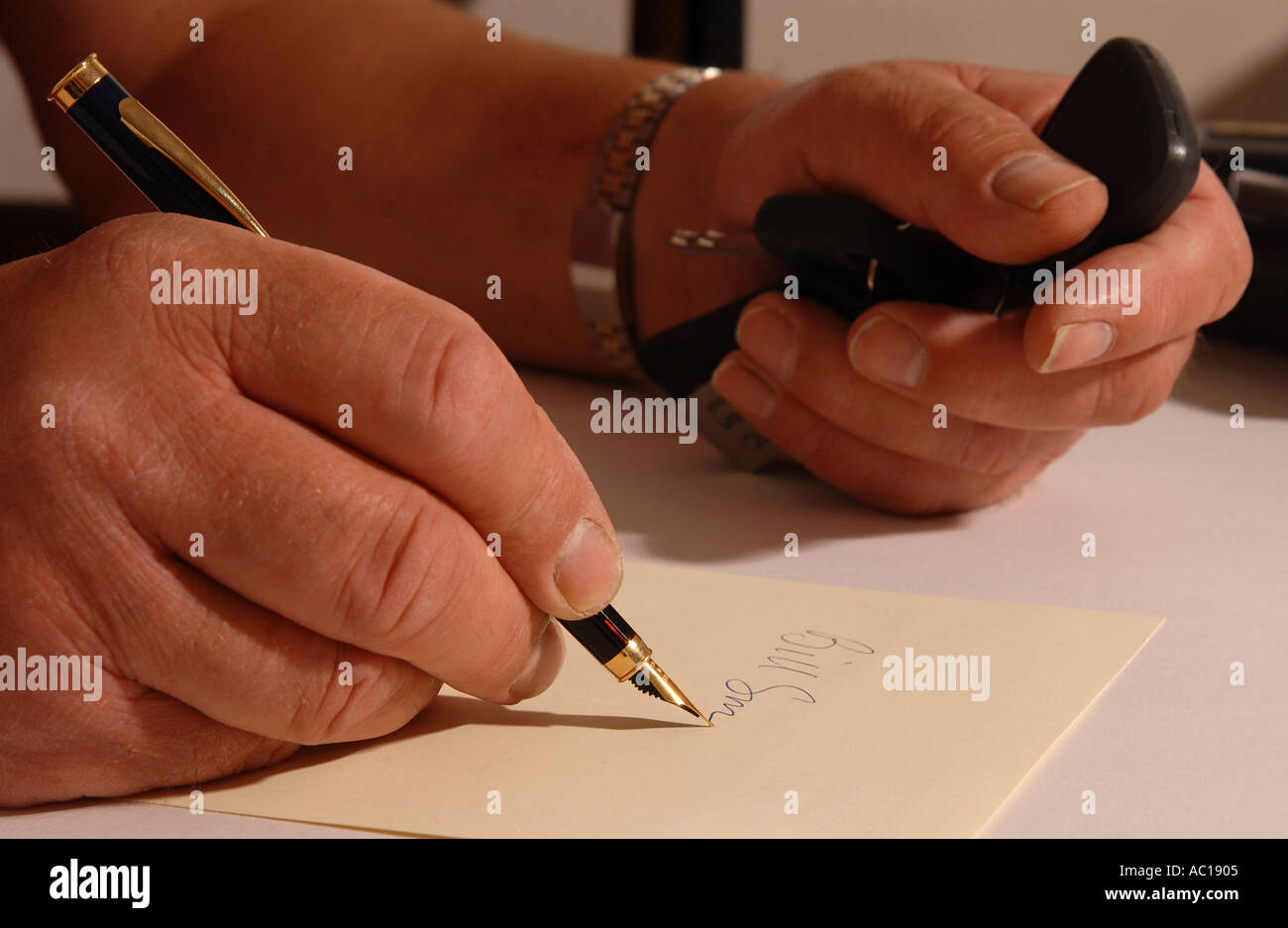 Human hand writing with pen Stock Photo - Alamy