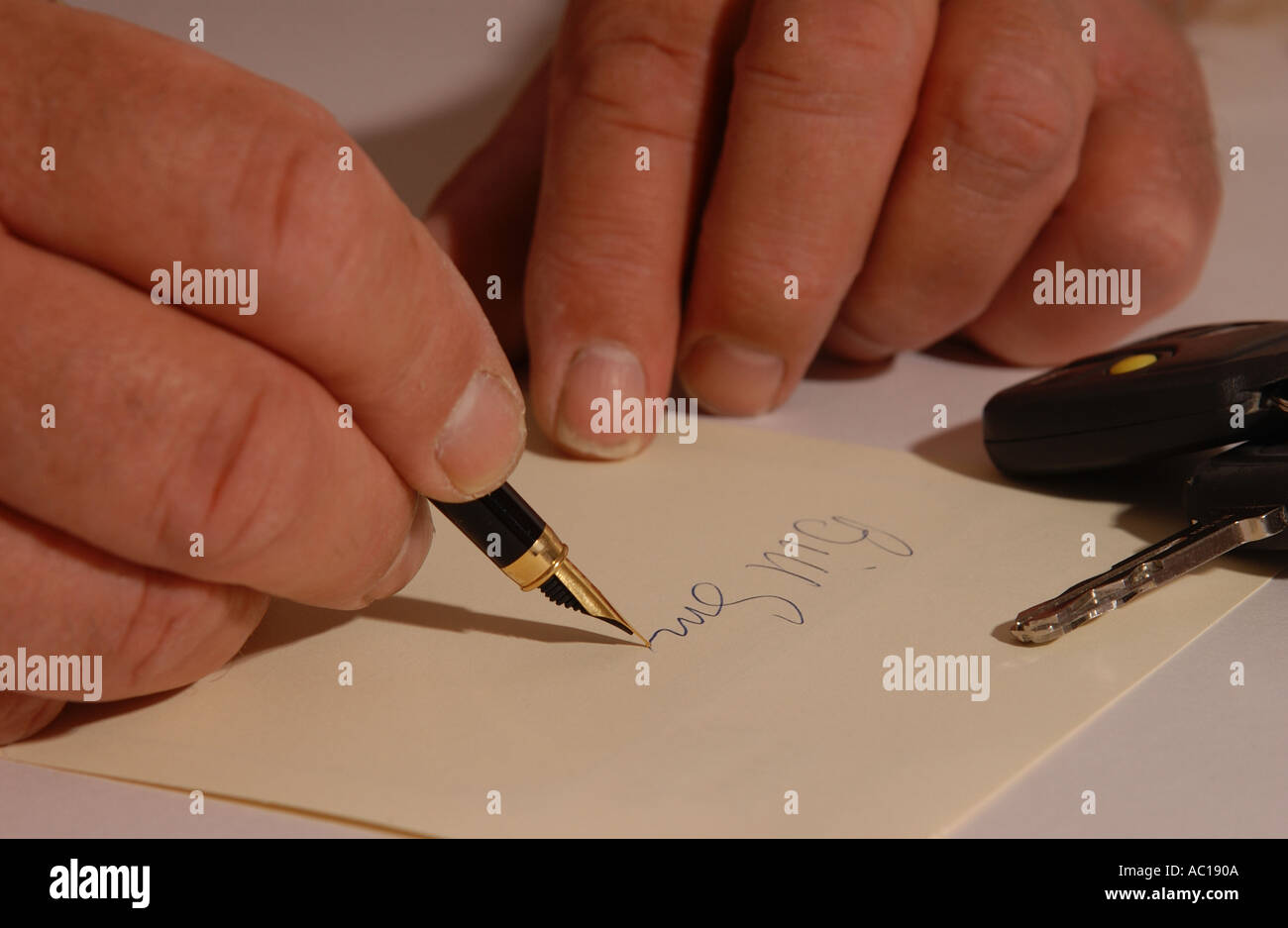 Human hand writing with pen Stock Photo - Alamy