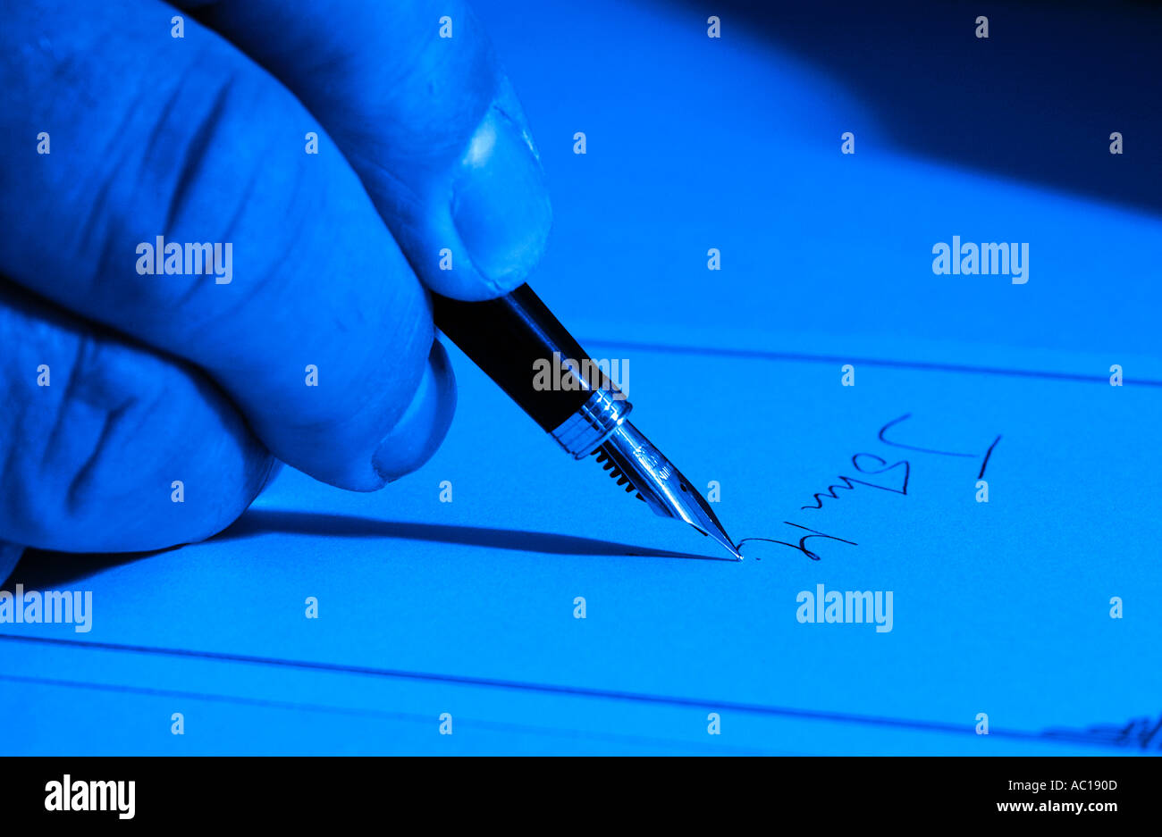 Human hand writing with pen Stock Photo - Alamy