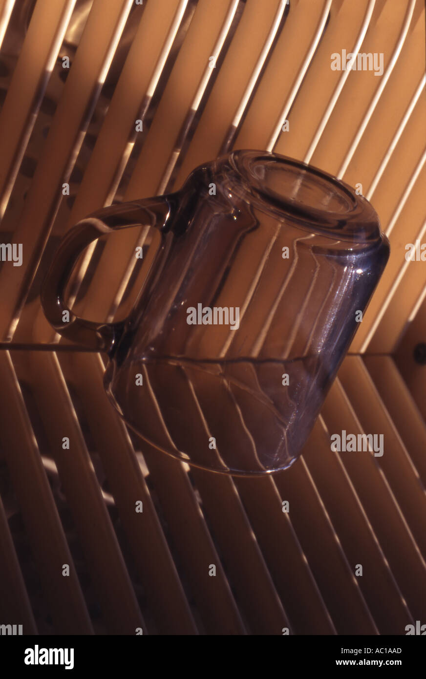 cup drying on draining board Stock Photo - Alamy