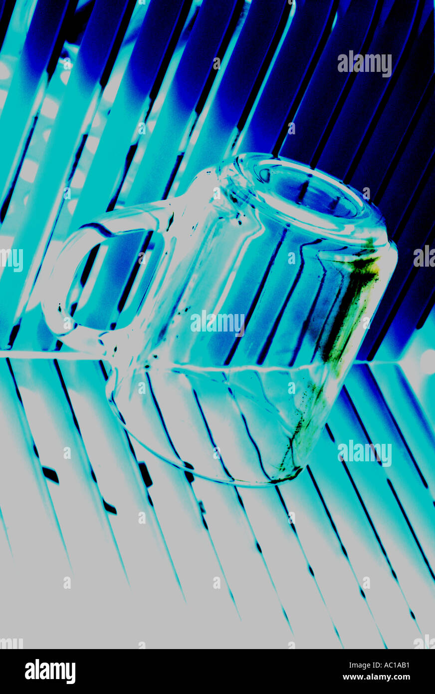 cup drying on draining board Stock Photo - Alamy