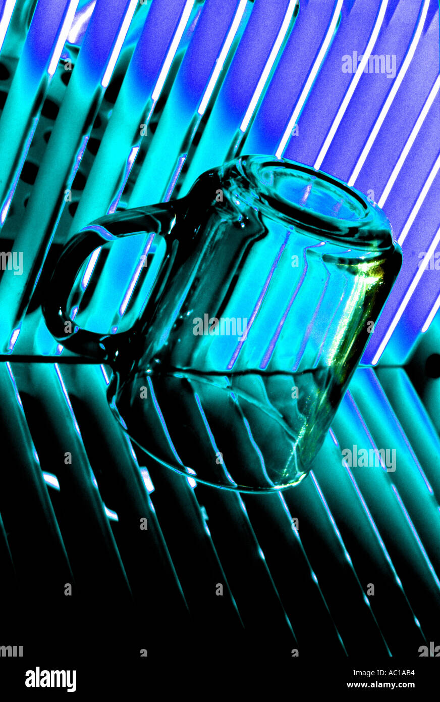 cup drying on draining board Stock Photo - Alamy