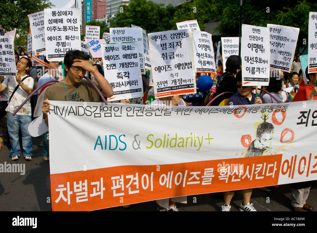 Young Koreans Marching with Aids Awareness Banner Marching in Gay Pride ...