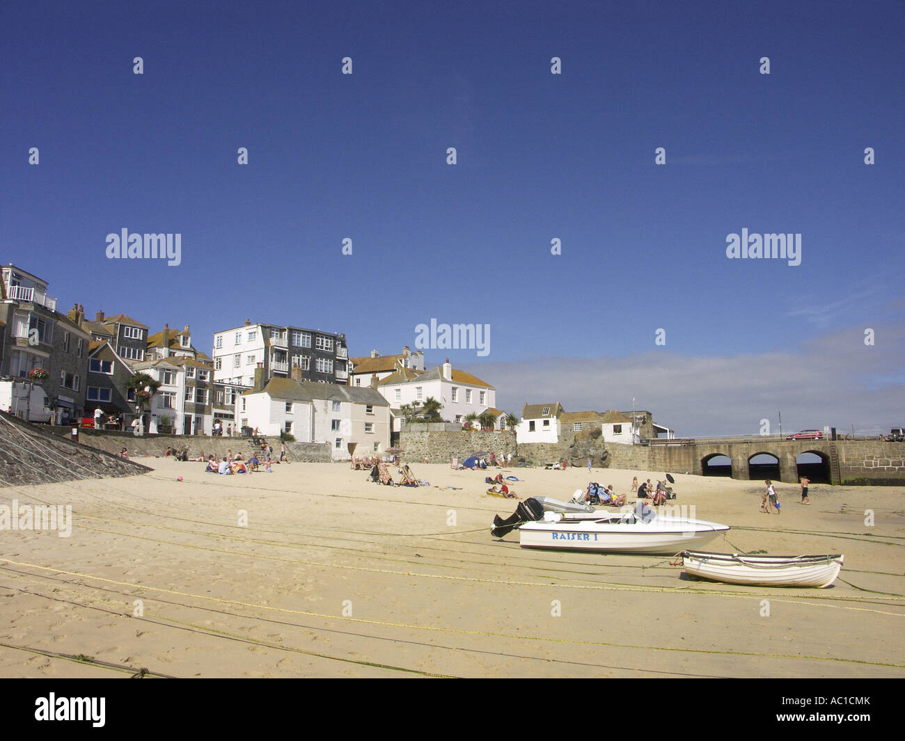 One of the two small beaches inside St Ives harbour Stock Photo - Alamy