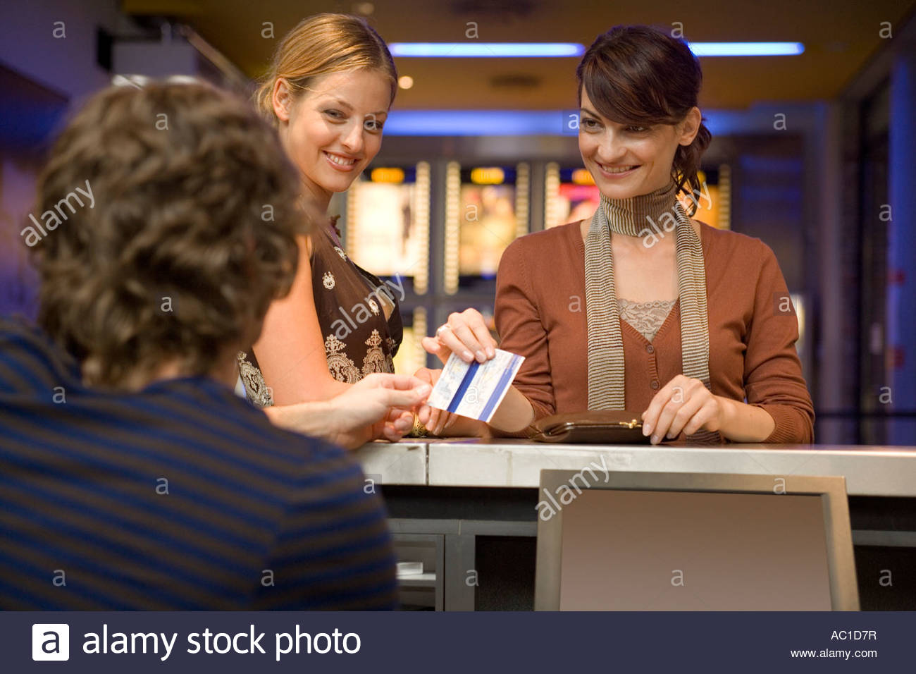 People Buying Movie Tickets Box High Resolution Stock Photography and ...