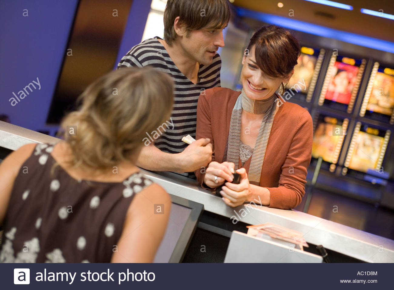People Buying Movie Tickets Box High Resolution Stock Photography and ...