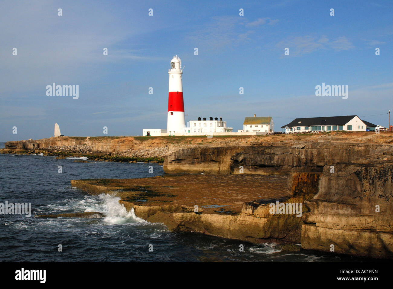 Portland Bill lighthouse taken from the clifftop above the treacherous ...