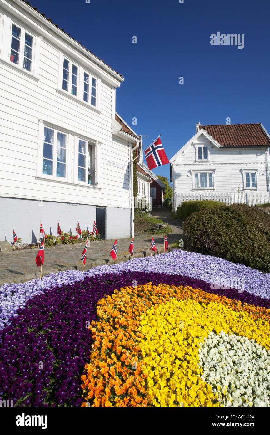Rainbow flower bed and the old wooden houses of Gamle Stavanger ...