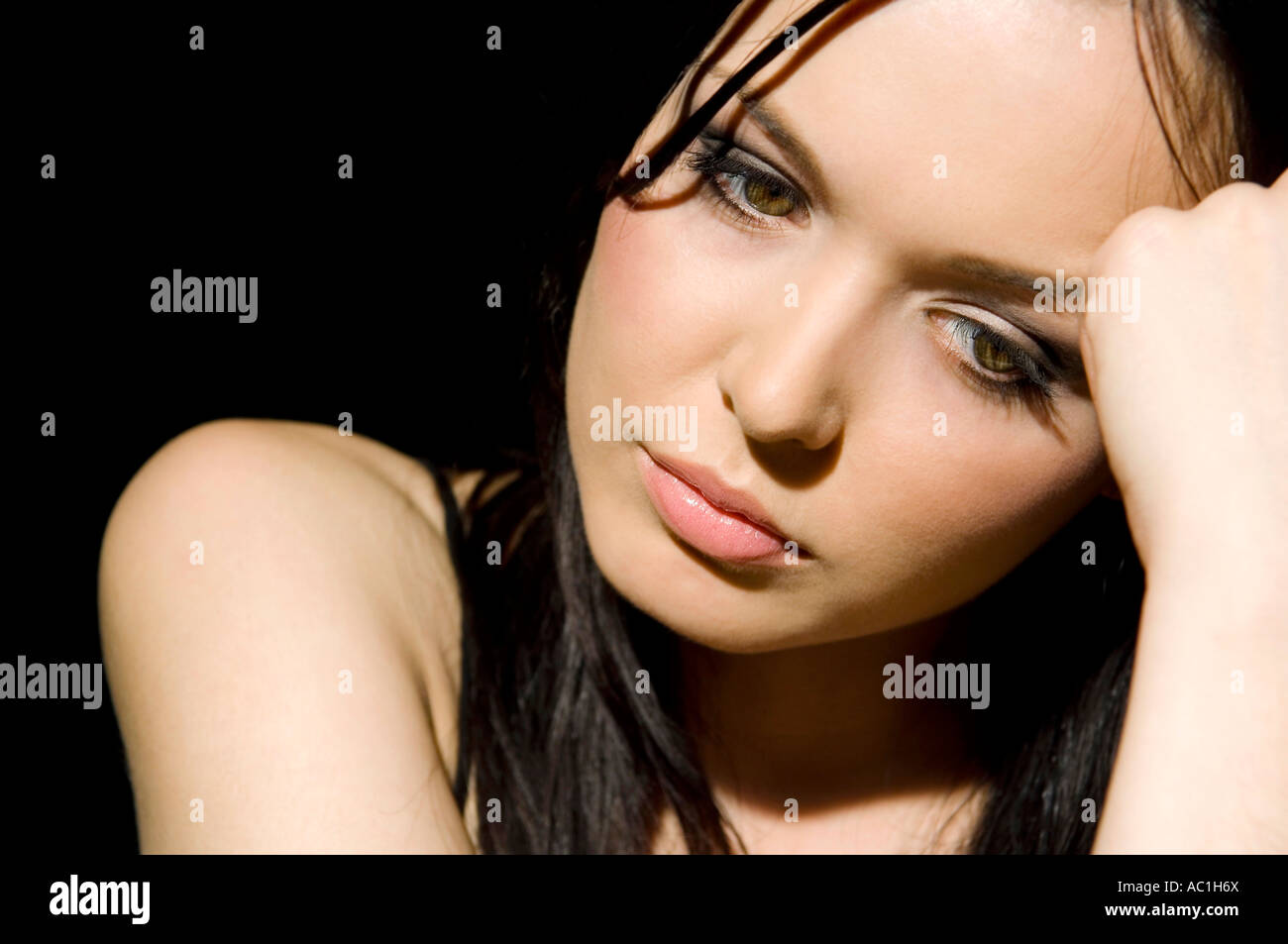 Supporting head on hand hi-res stock photography and images - Alamy