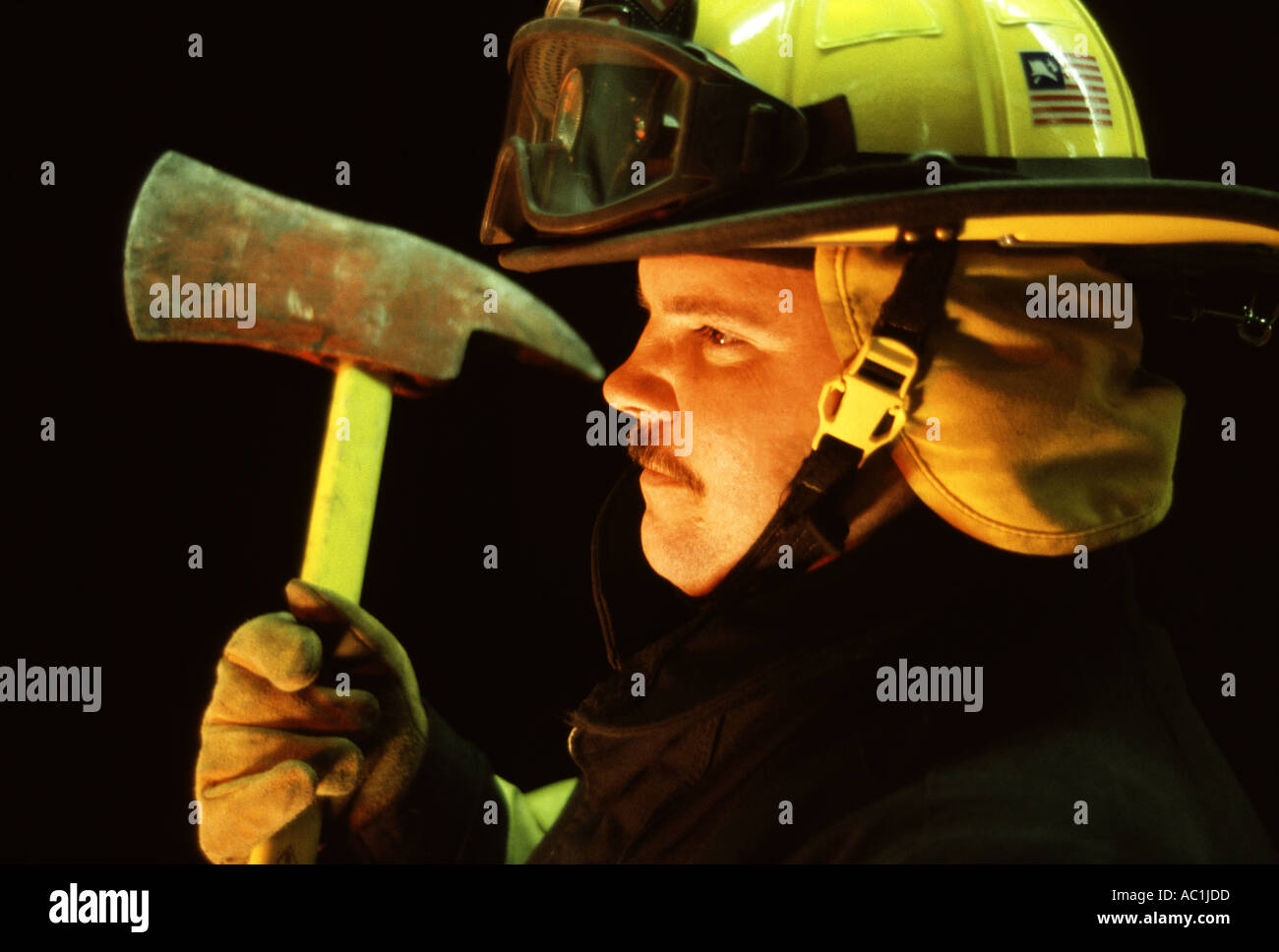 Portriat of a Fire Fighter with an ax Stock Photo - Alamy