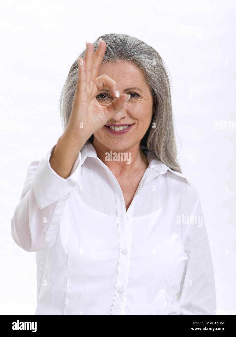 Senior woman hand making hi-res stock photography and images - Alamy
