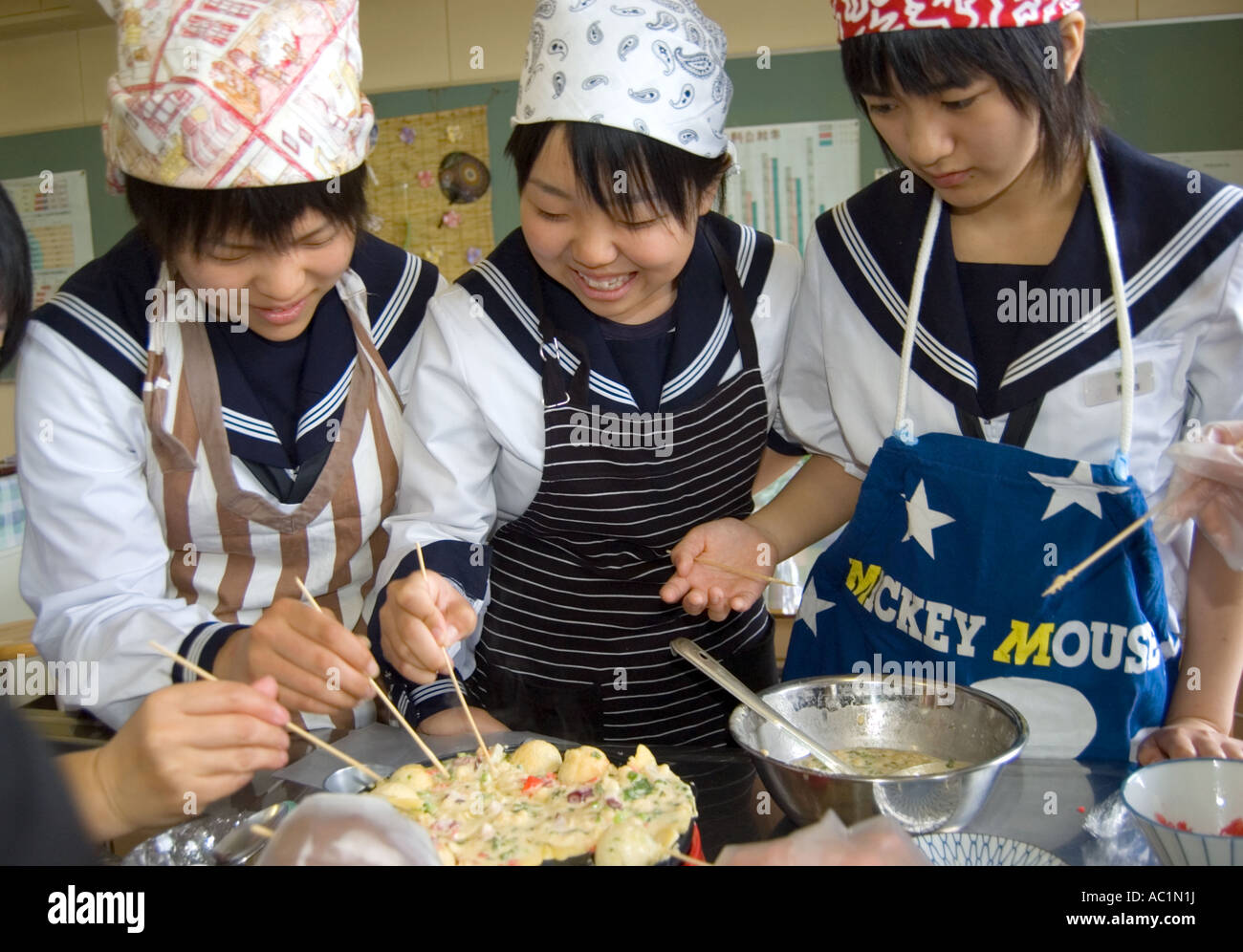 Japanese students preparing octopus fritters Japan Asia Stock Photo - Alamy