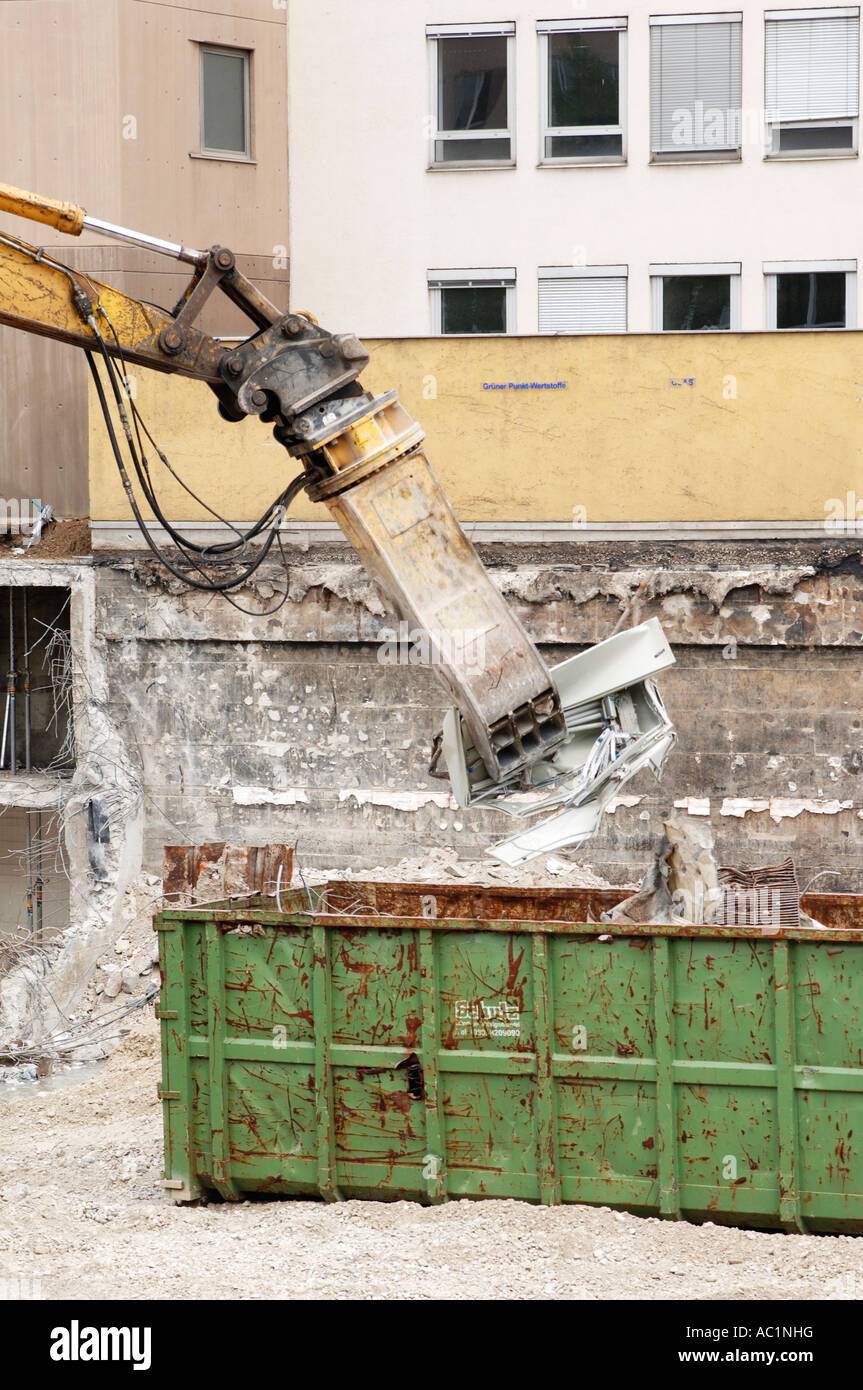Wrecking crane and debris container Stock Photo - Alamy